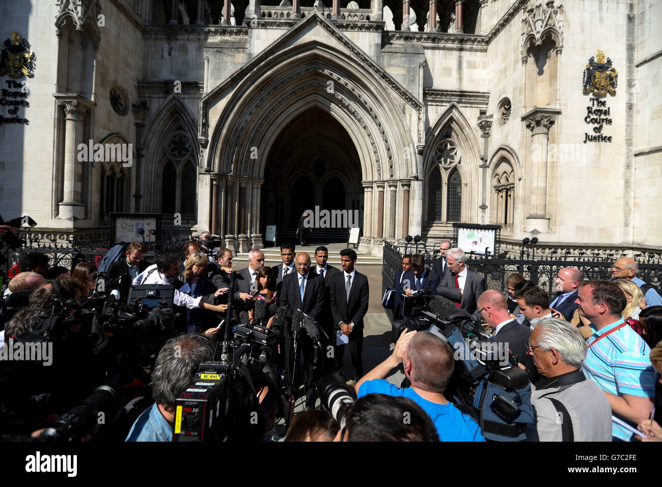 Jacintha Saldhana's husband Benedict Barboza (left, behind Mr Vaz) and ...
