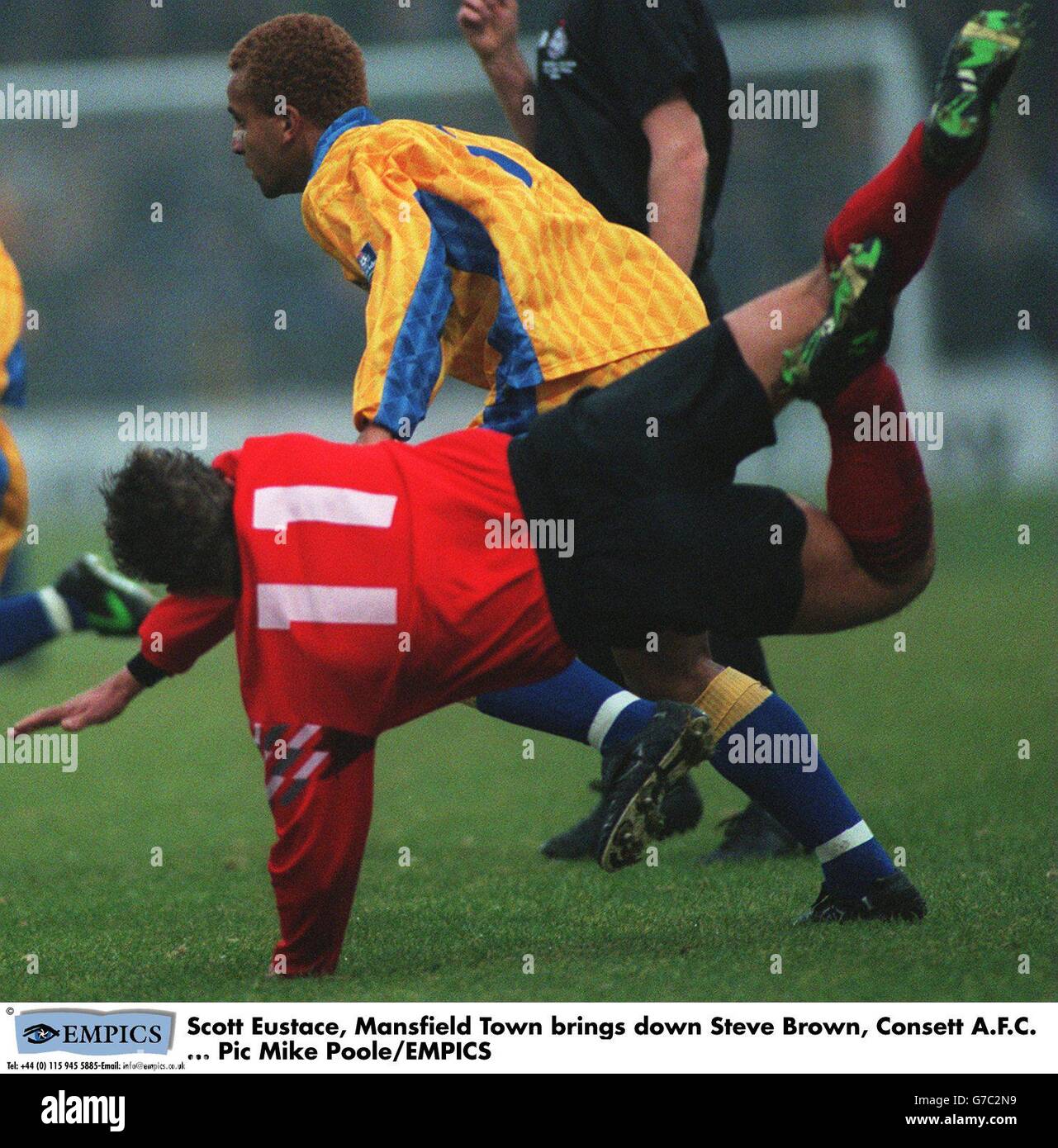 Scott Eustace, Mansfield Town brings down Steve Brown, Consett A.F.C ...