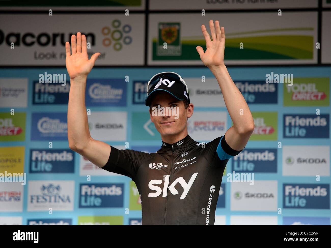 Team Sky's Ben Swift celebrates on the podium before receiving the ...