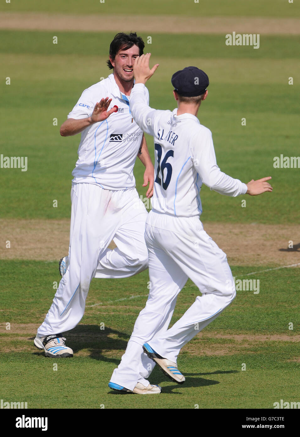 Derbyshire's Mark Footitt (left) celebrates with Ben Slater after ...