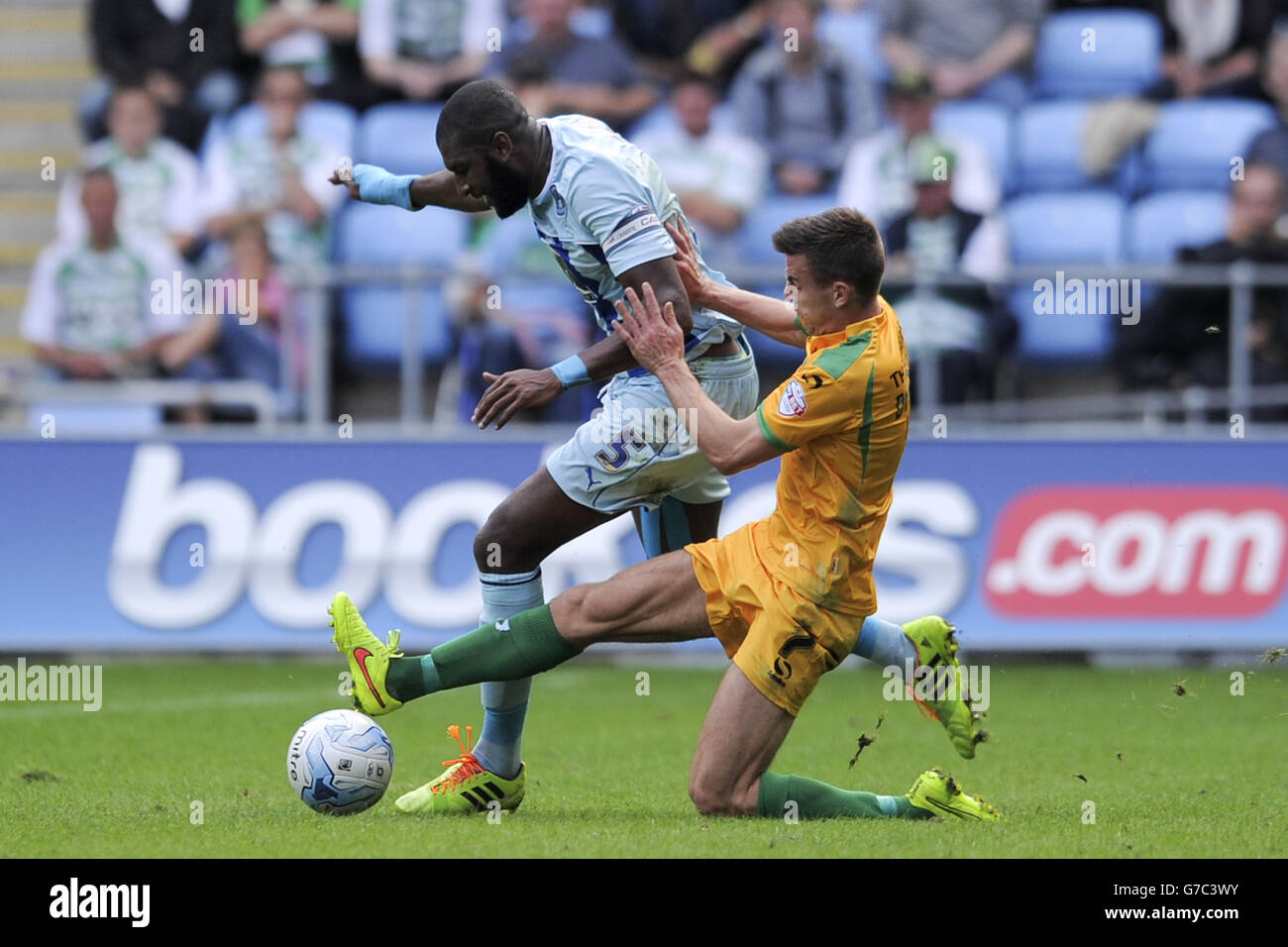 Coventry City's Reda Johnson (left) and Yeovil Town's Kevin Dawson ...