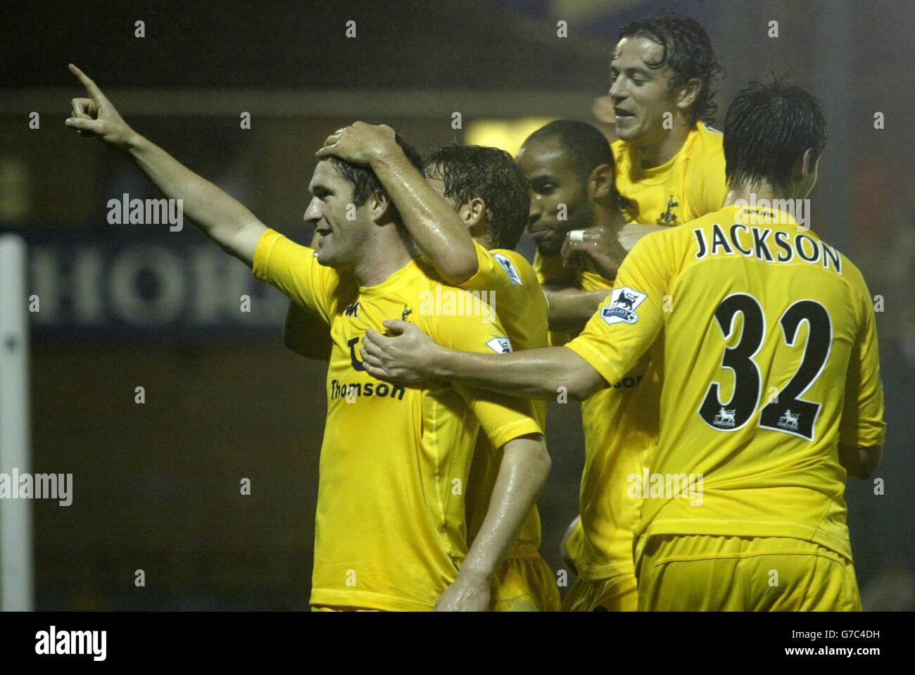Tottenham Hotspur's Robbie Keane (left) is congratulated by his team ...