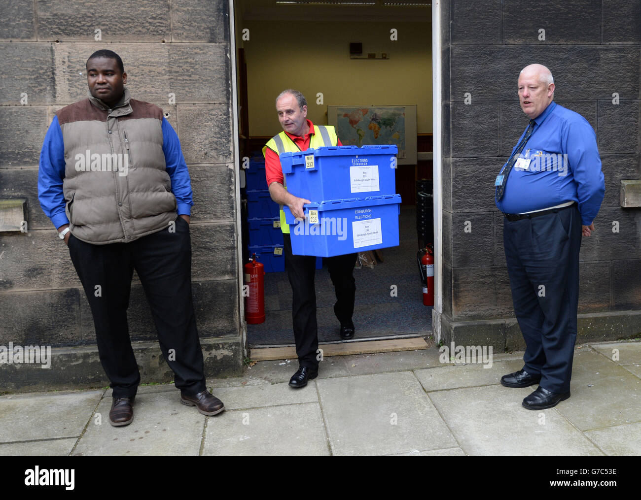 Ballot boxes and polling station signs are loaded into vans in ...
