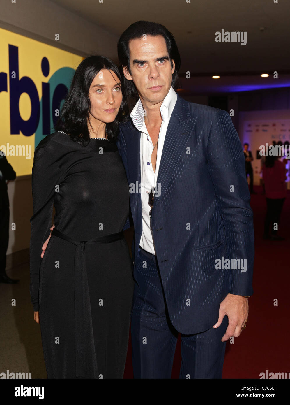 Nick Cave and his wife Susie Bick arriving for the gala screening of ...