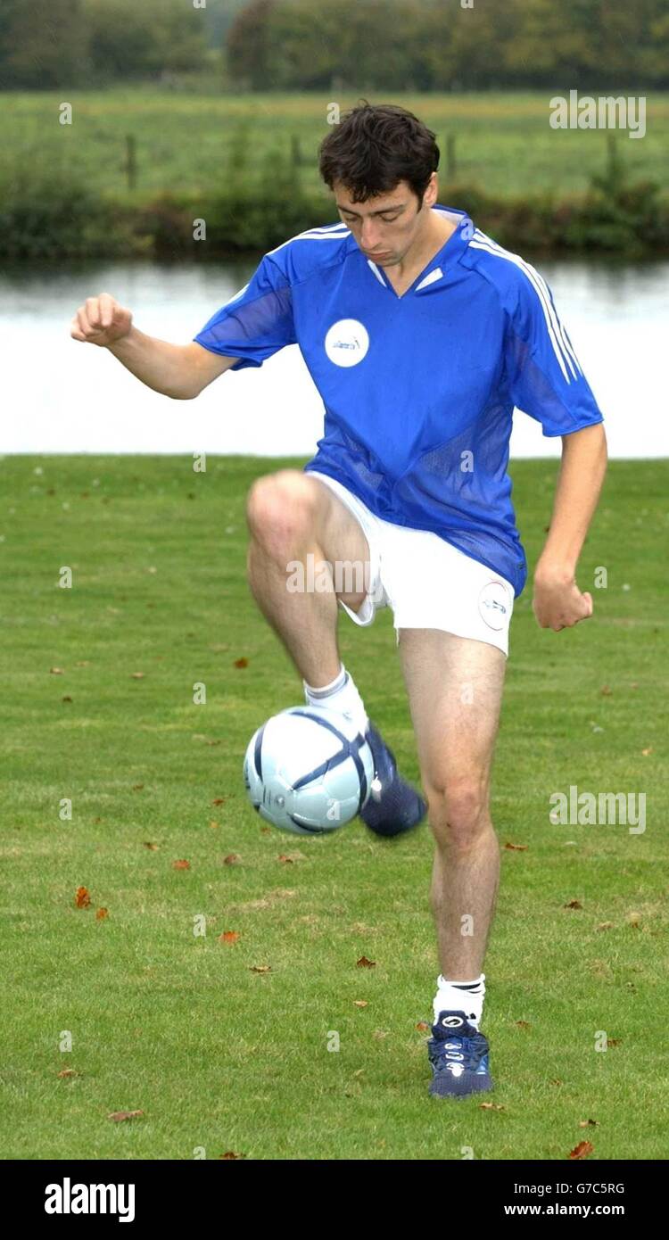 Celebrity footballer Ralf Little poses for photographers during a ...