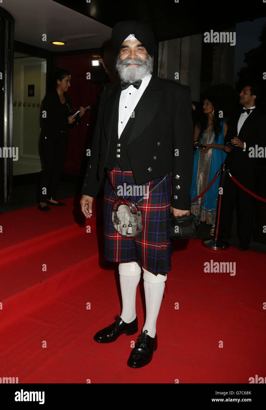 Asian Achievers Awards - London. Dilawar Singh MBE arriving for the ...