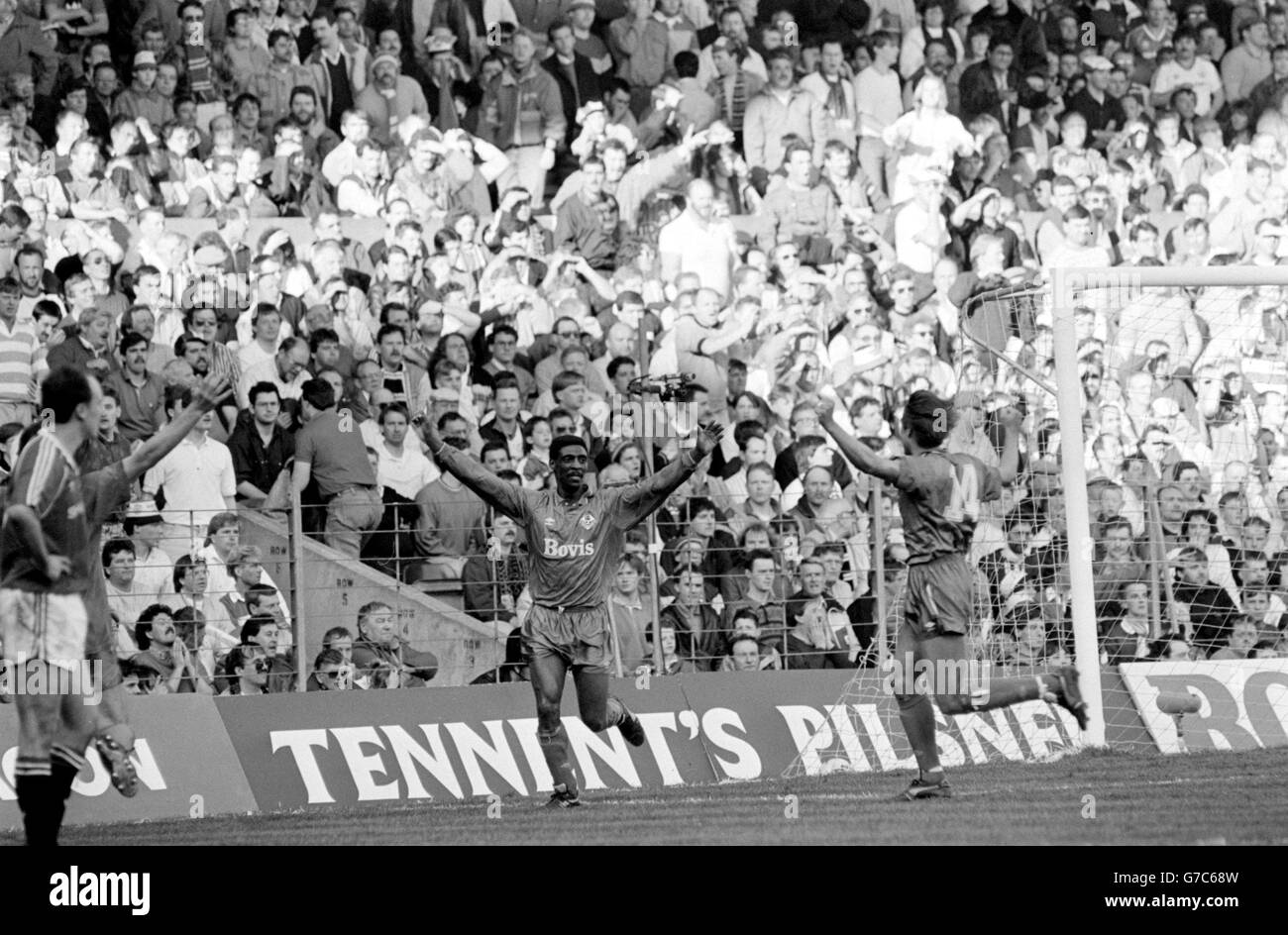 Scorer of Oldham's third goal Roger Palmer (L) as Paul Warhurst ...
