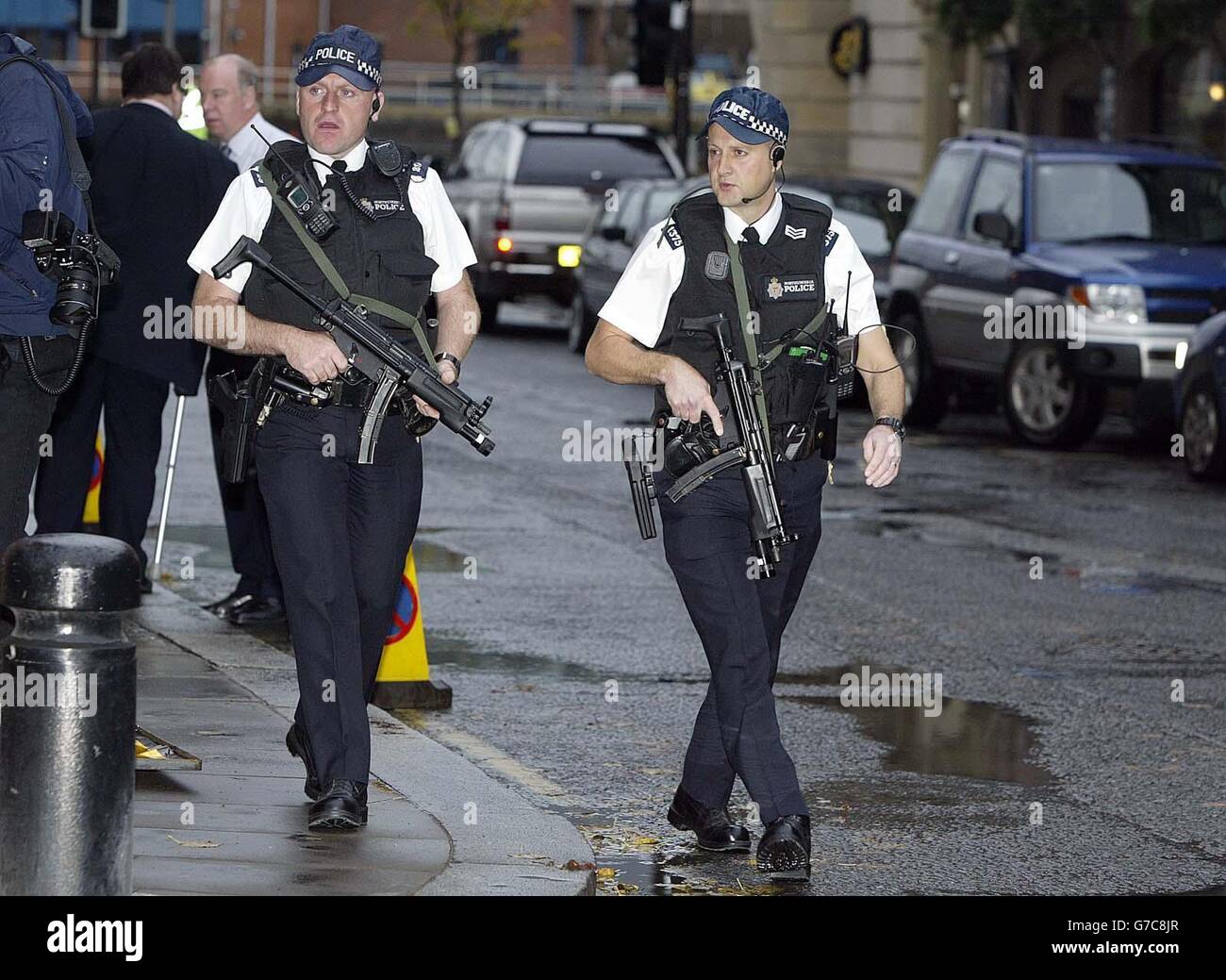 Armed Police on guard at Newcastle Crown Court as the convoy carrying ...