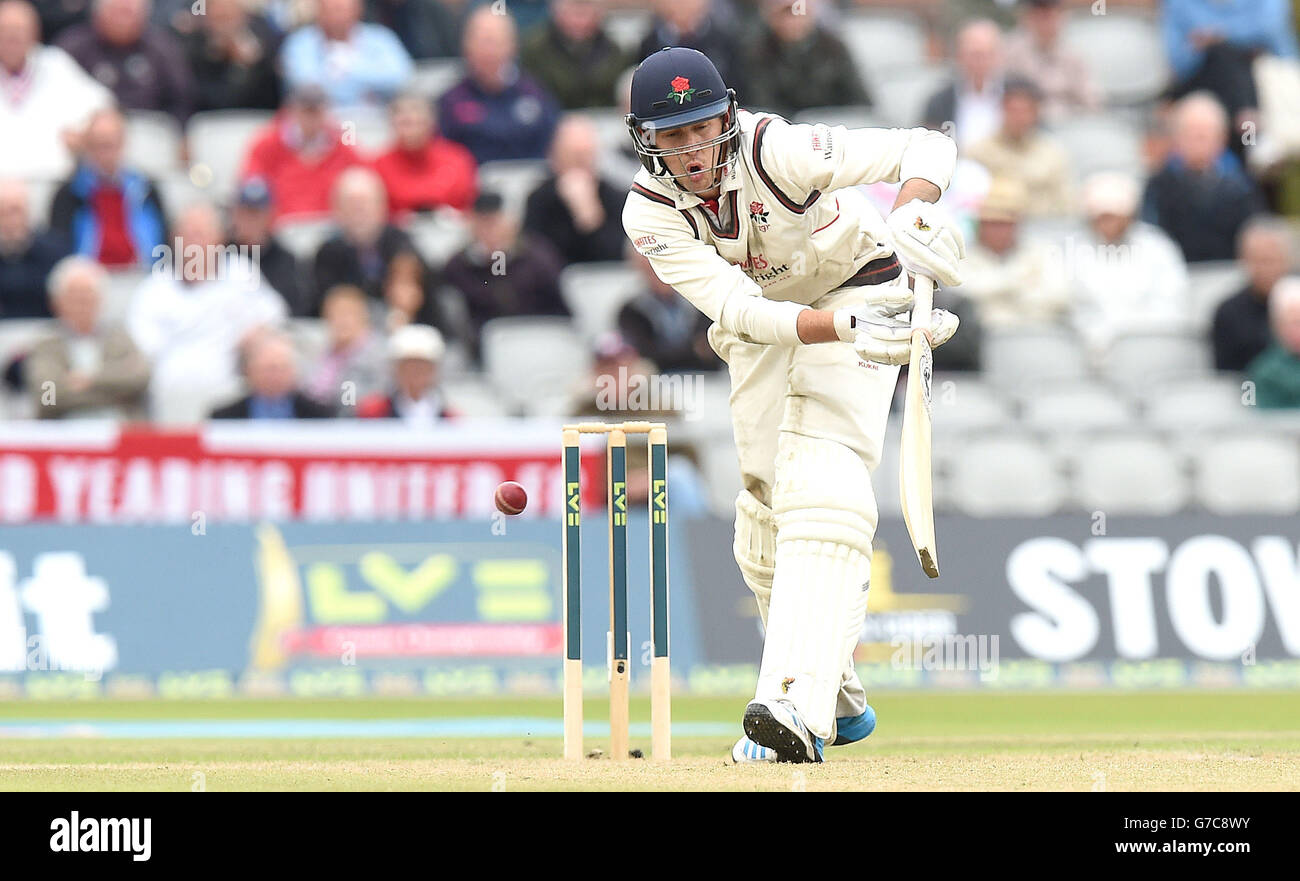 Lancashire's Tom Bailey is hit be a delivery from Middlesex bowler Toby ...