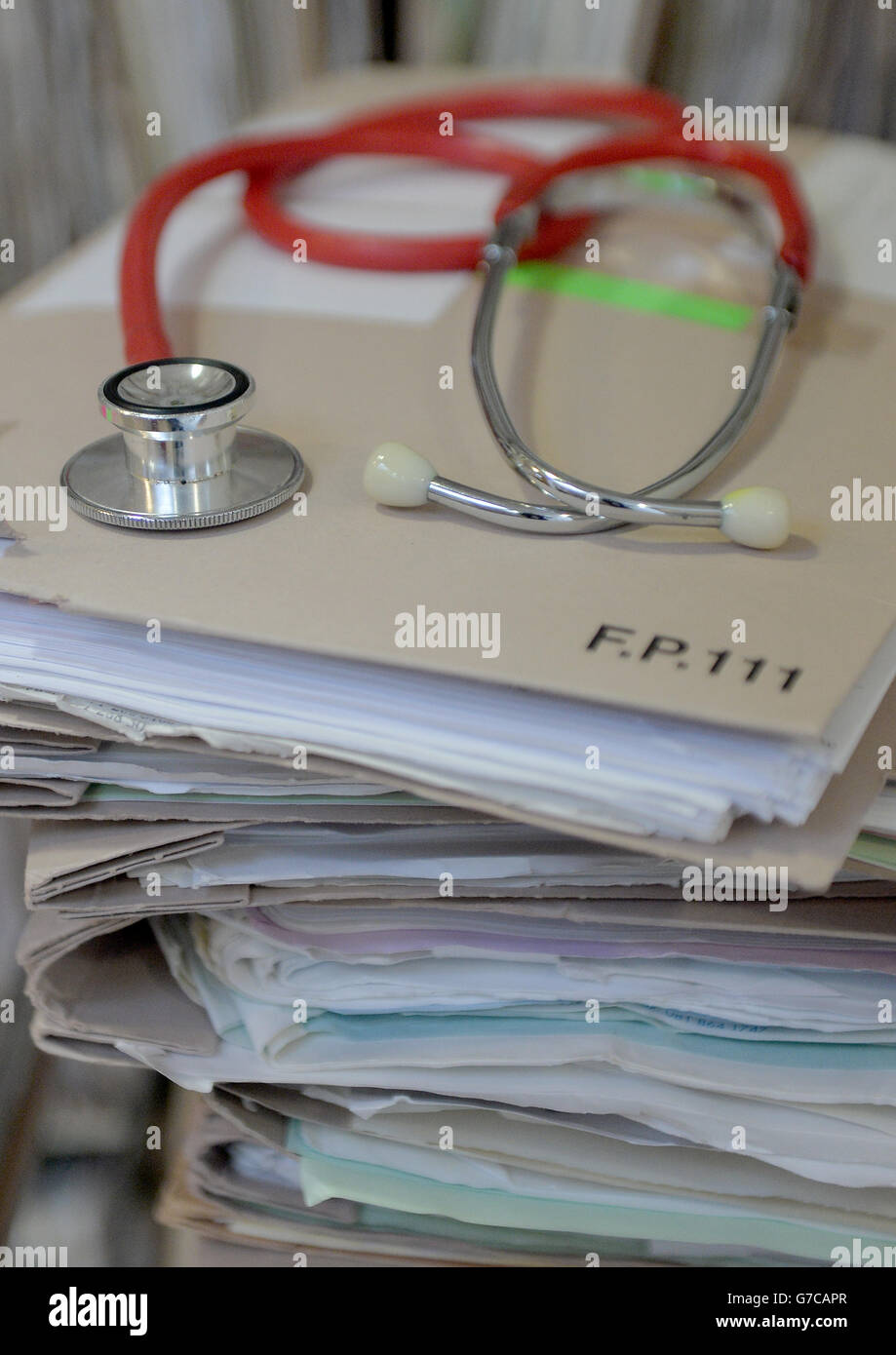 A stethoscope on top of patient's files at the Temple Fortune Health ...