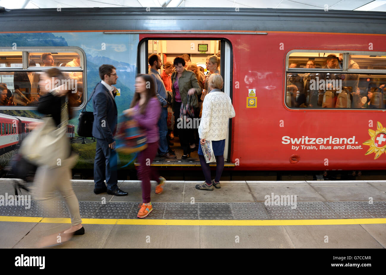 News rail commuter hi-res stock photography and images - Alamy