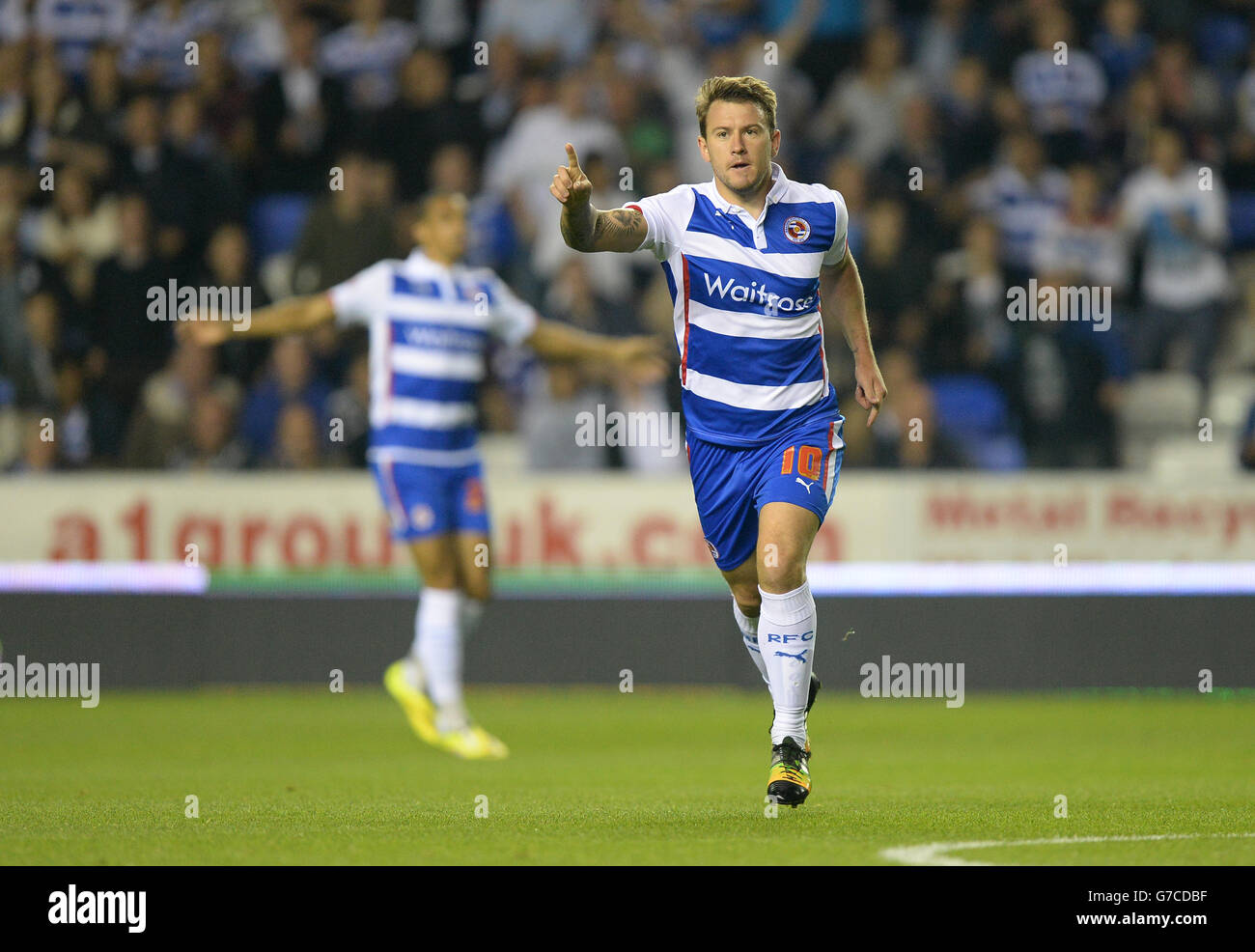 Reading's Simon Cox celebrates after he scores his side's first goal of ...