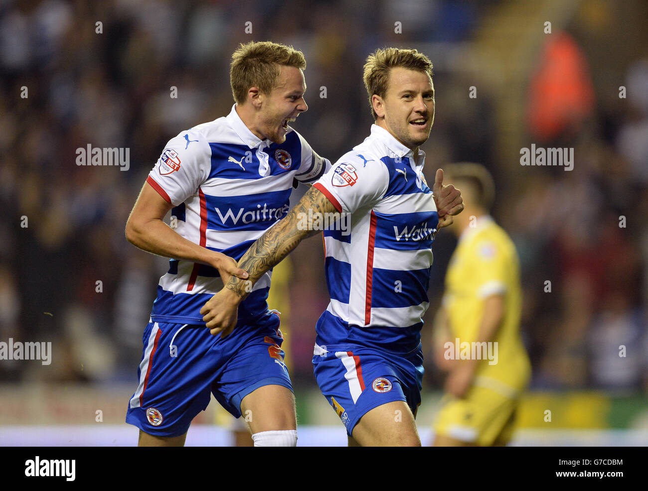 Reading's Simon Cox celebrates with team mate Chris Gunter (left) after ...