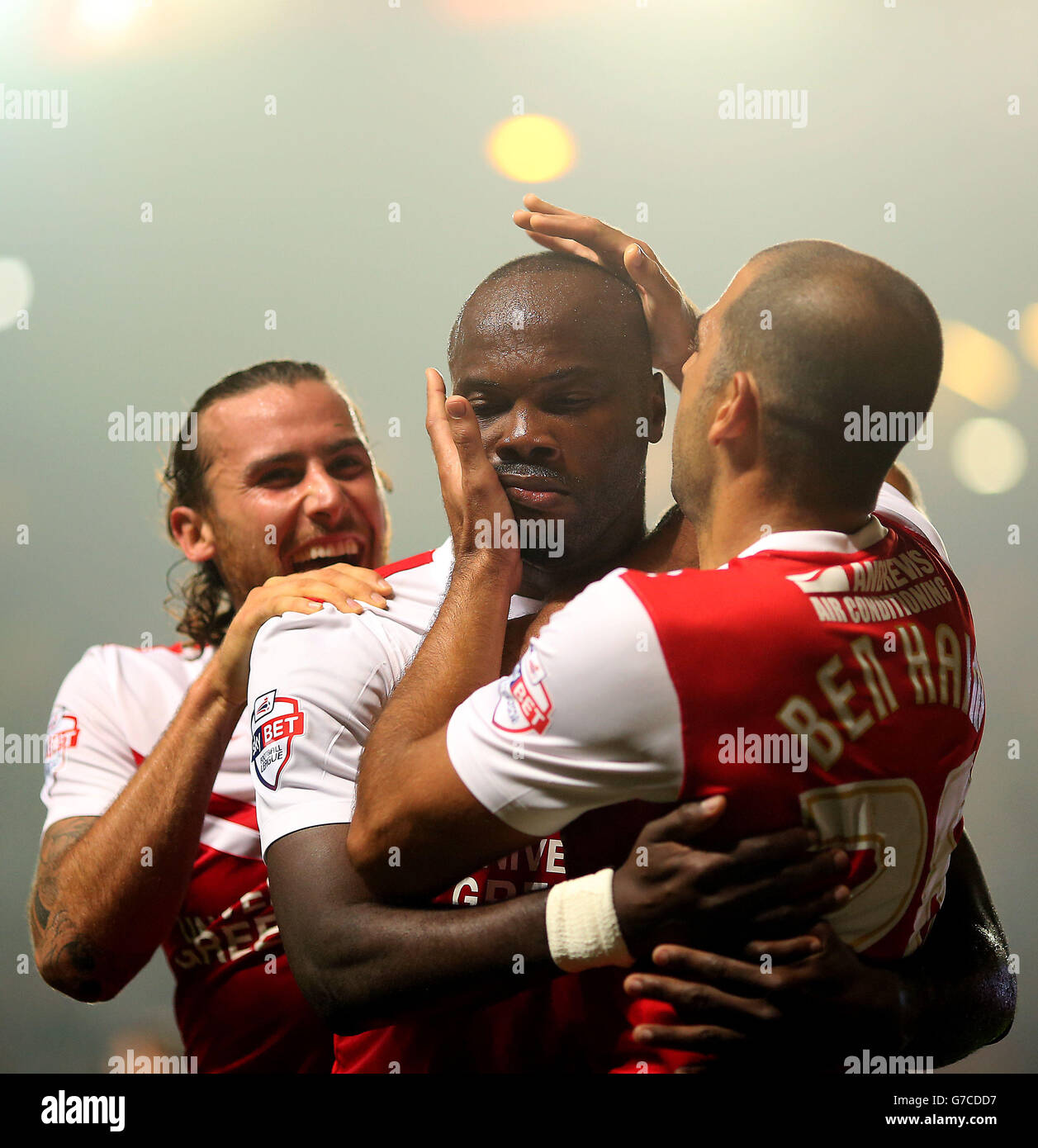 Charlton Athletic's Andre Bikey is mobbed by team mates as he ...