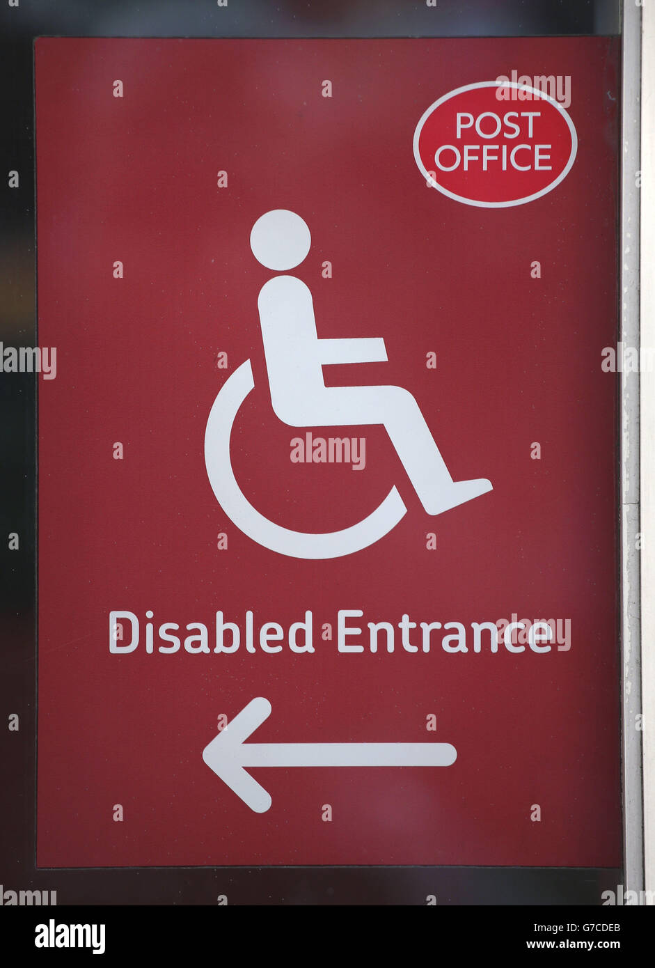 Disability stock. A sign for disabled access on a Post Office in ...
