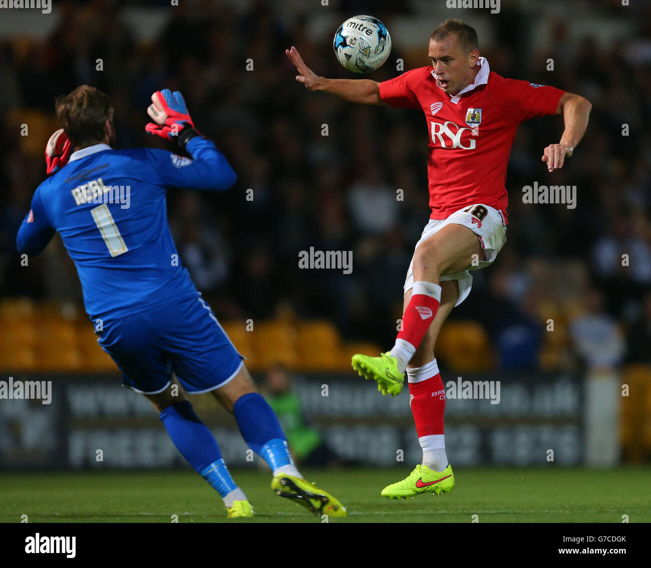 Bristol Citys Aaron Wilbraham goes around Port Vales Chris Neal to ...