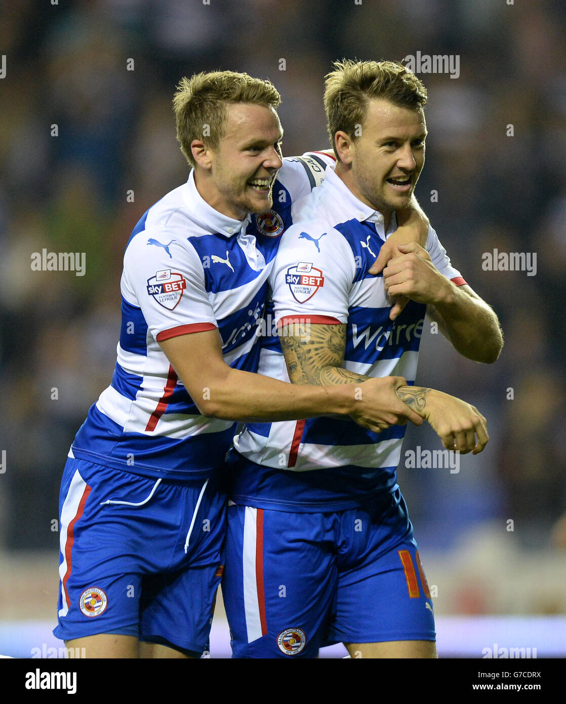 Reading's Simon Cox celebrates with team mate Chris Gunter (left) after ...