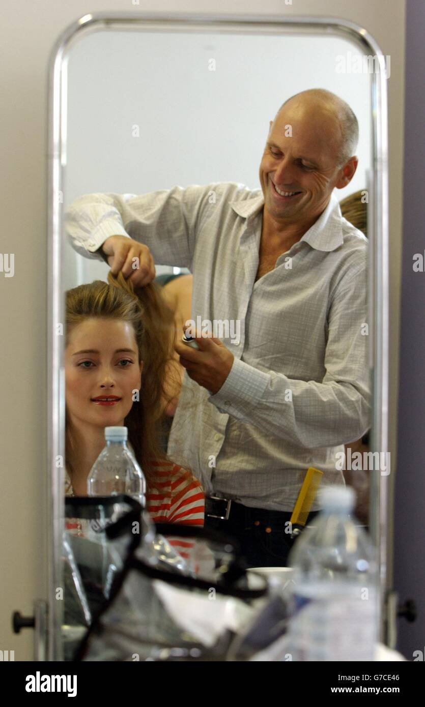 A model gets her hair done during the London Fashion Week Spring/Summer ...