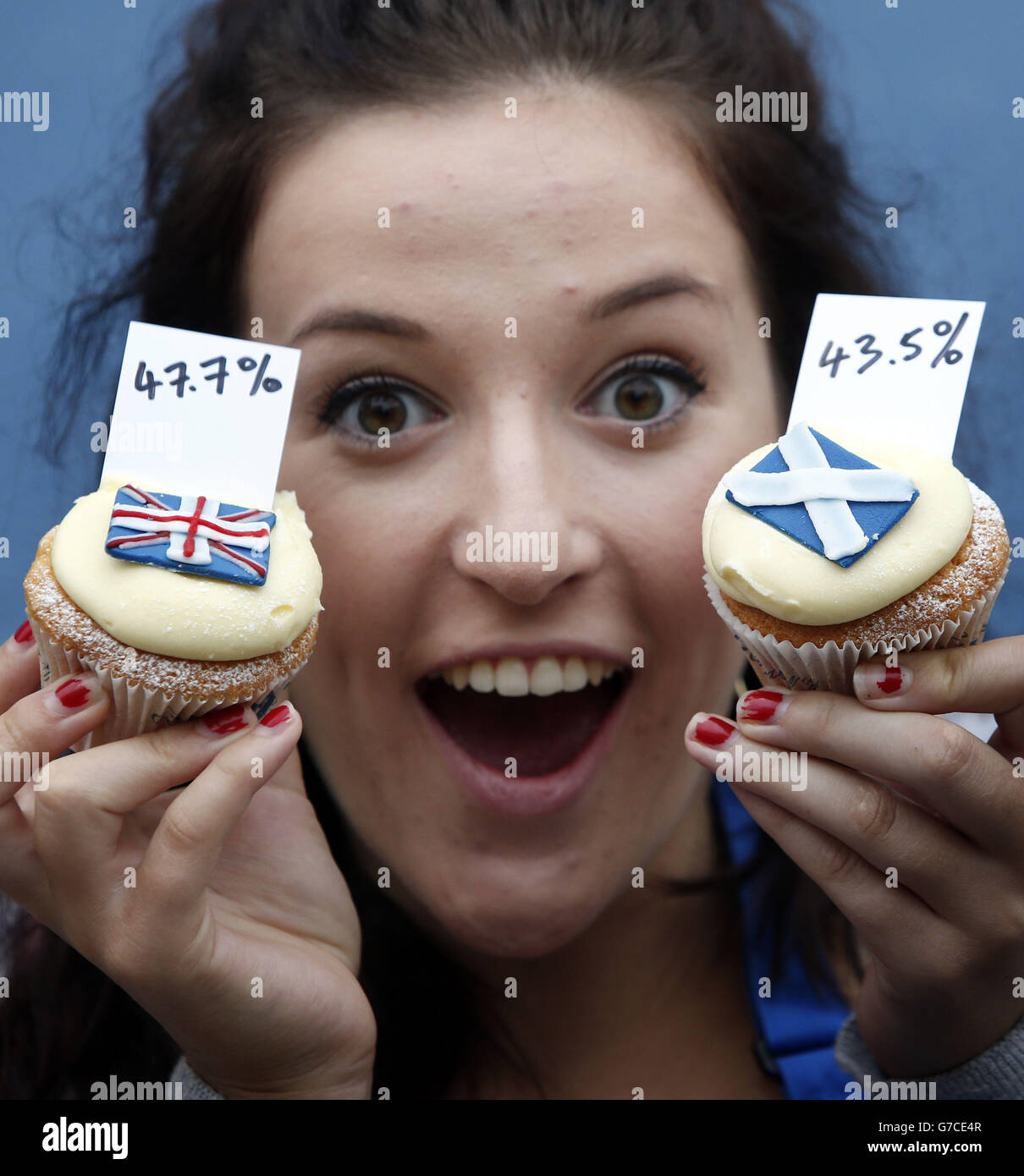 Pippa Perriam holds cupcakes at Edinburgh bakery Cuckoo's that show the results of their cupcake ...