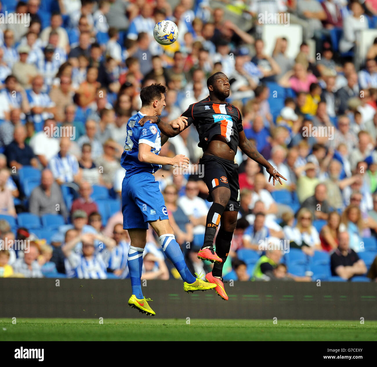 Brighton and Hove Albion's Lewis Dunk (left) and Blackpool's Ishmael ...