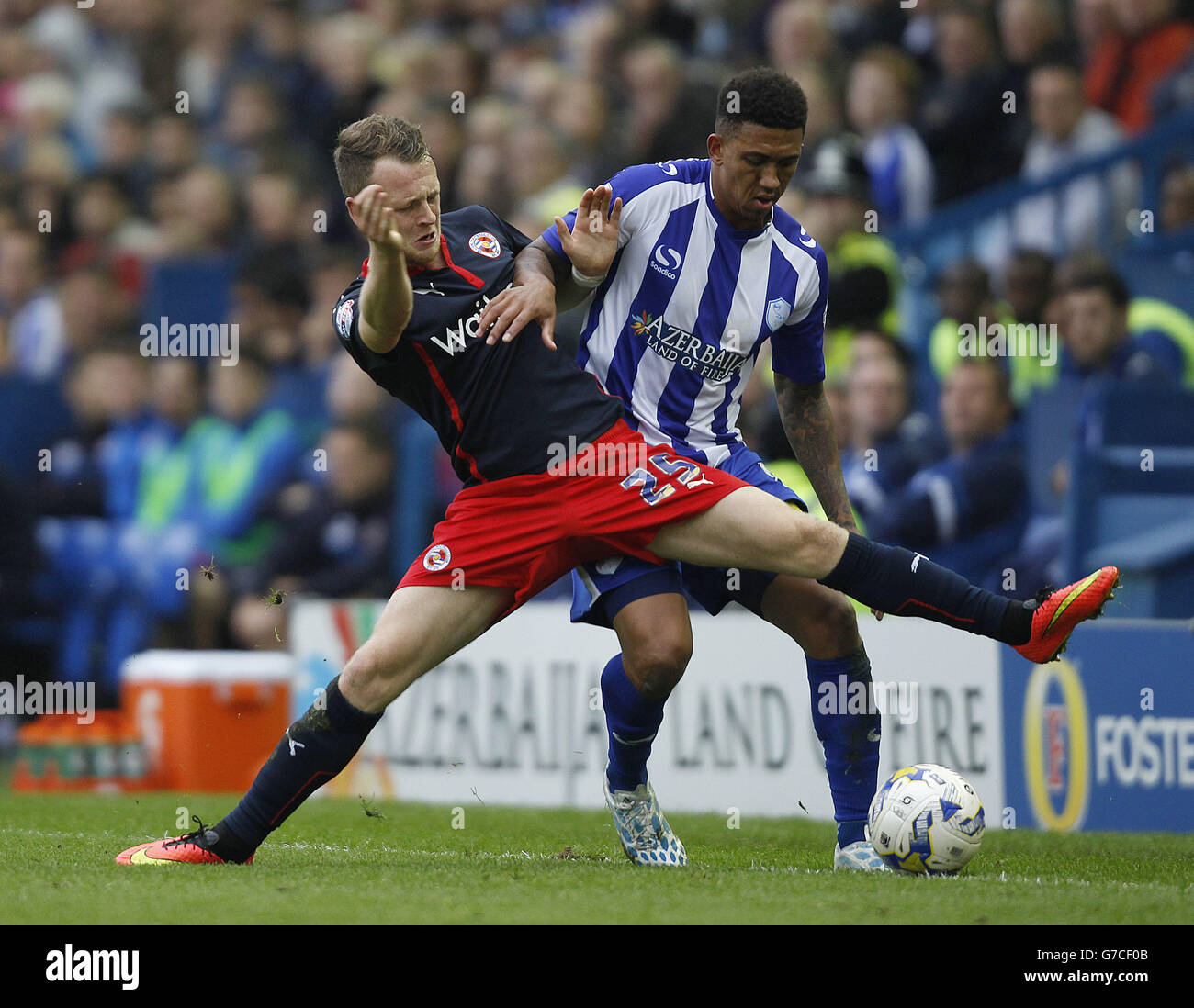 Sheffield Wednesday's Liam Palmer and Reading's Jake Taylor battle for ...