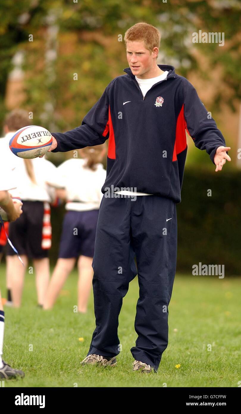 Prince Harry teaching Rugby to school children Stock Photo - Alamy