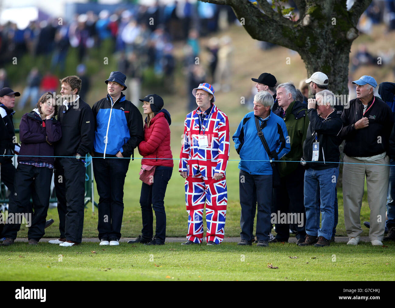 A fan in a Union flag suit shows his support during the fourballs on ...
