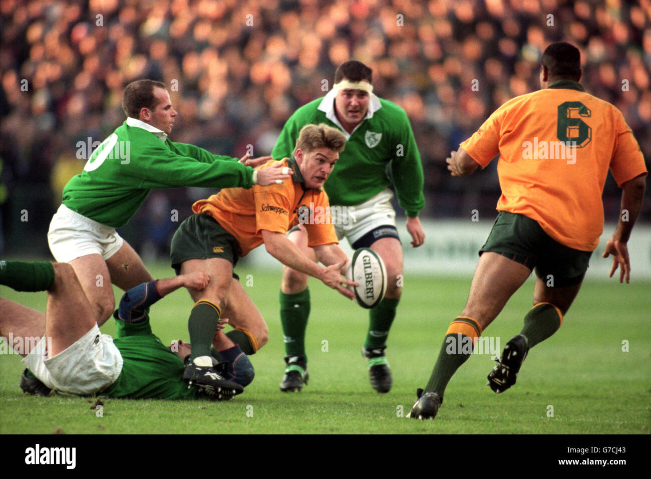 Rugby Union-Dublin-Ireland v Australia. Tim Horan manages to get the ...
