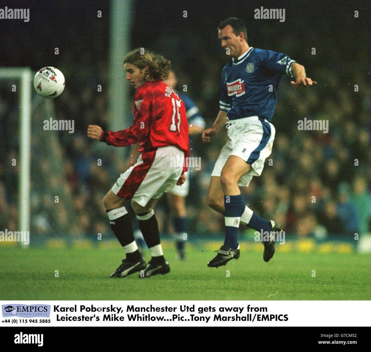Manchester united gets away from leicester citys mike whitlow hi-res ...