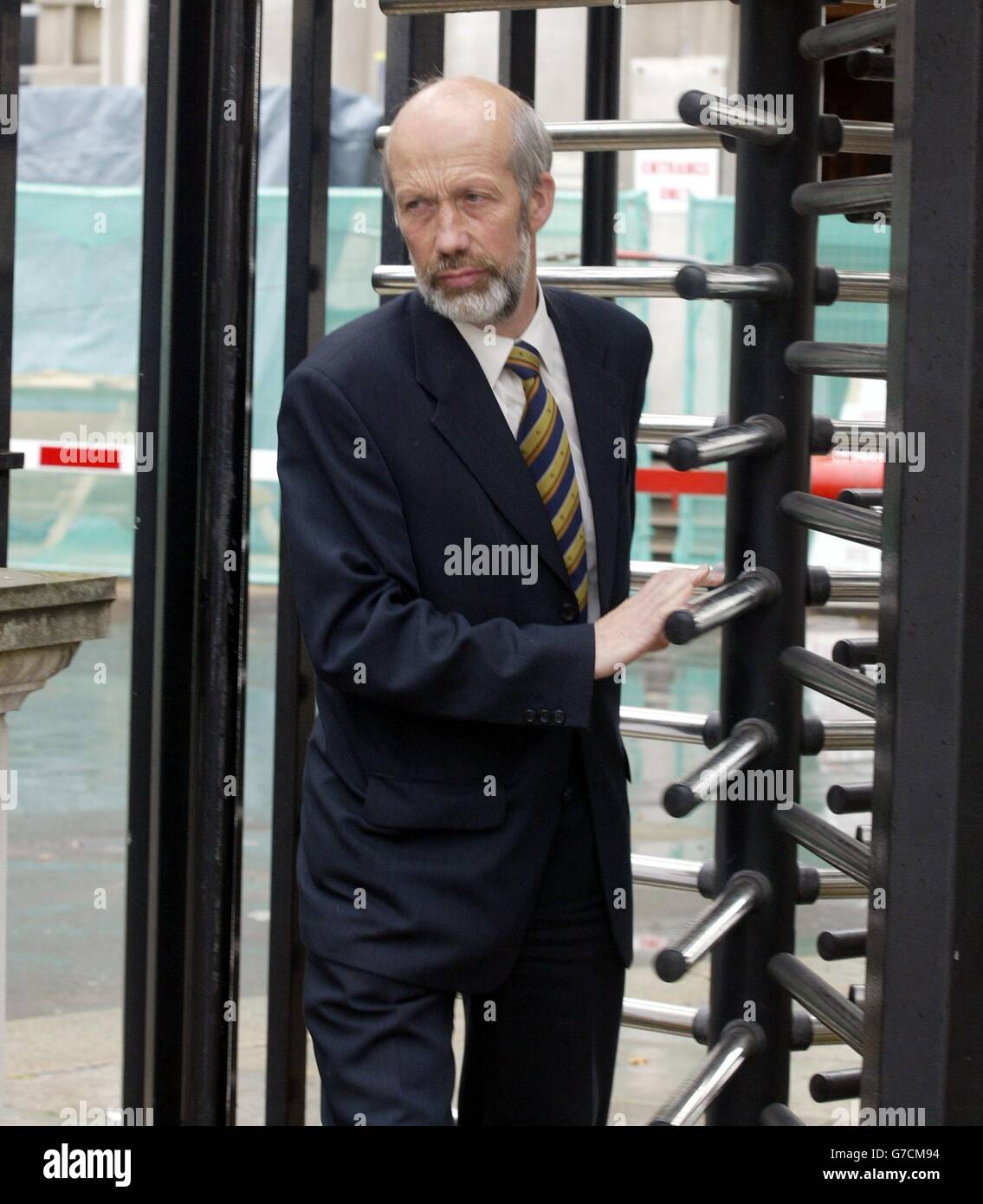 David Ford, leader of the Alliance party, leaves Belfast High Court ...