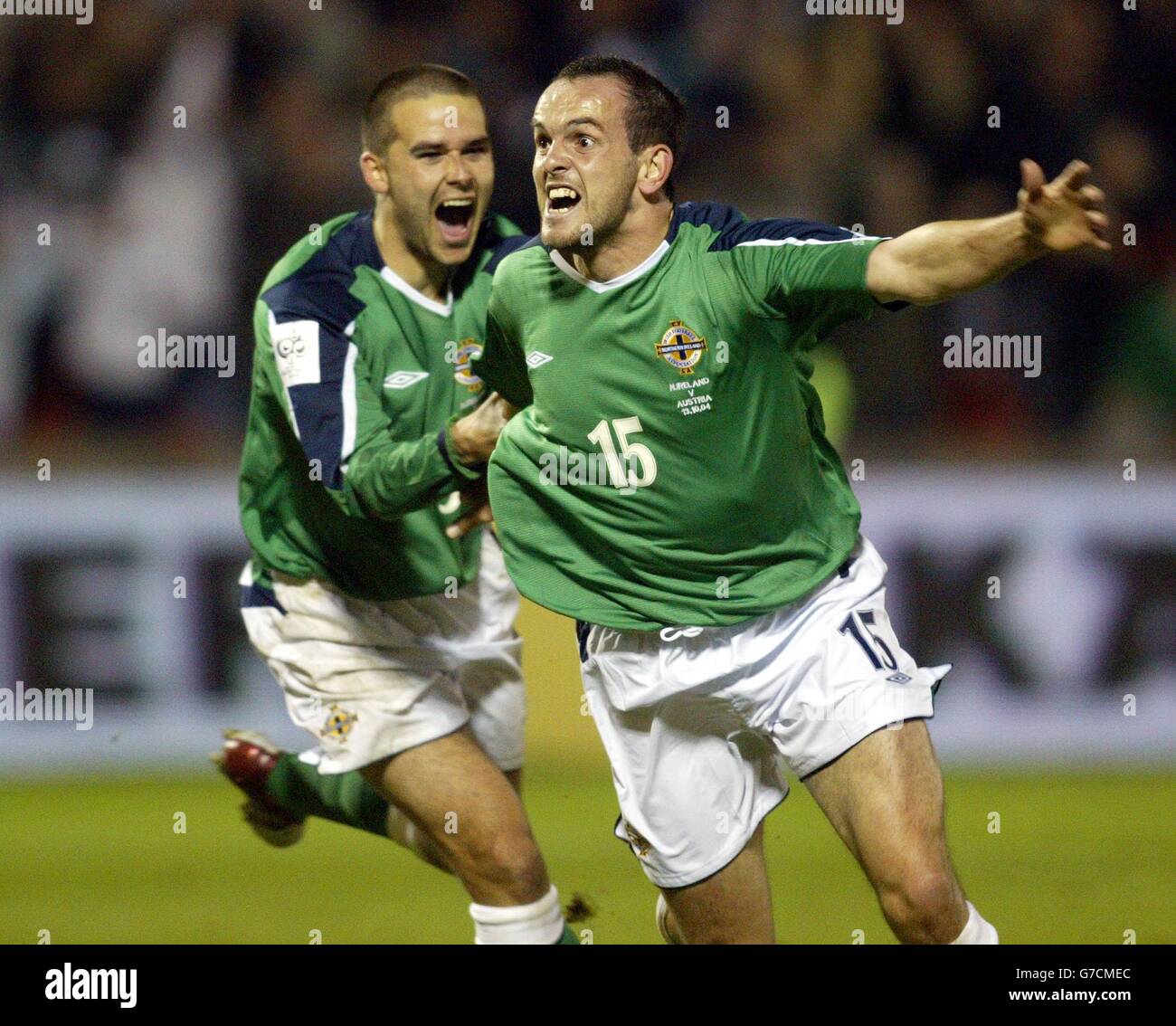 Northern Ireland's Stuart Elliott (right) celebrates scoring the last ...
