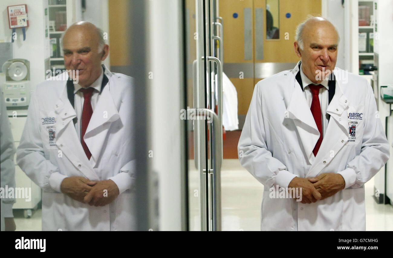 Business secretary vince cable reflected in a glass door hi-res stock ...