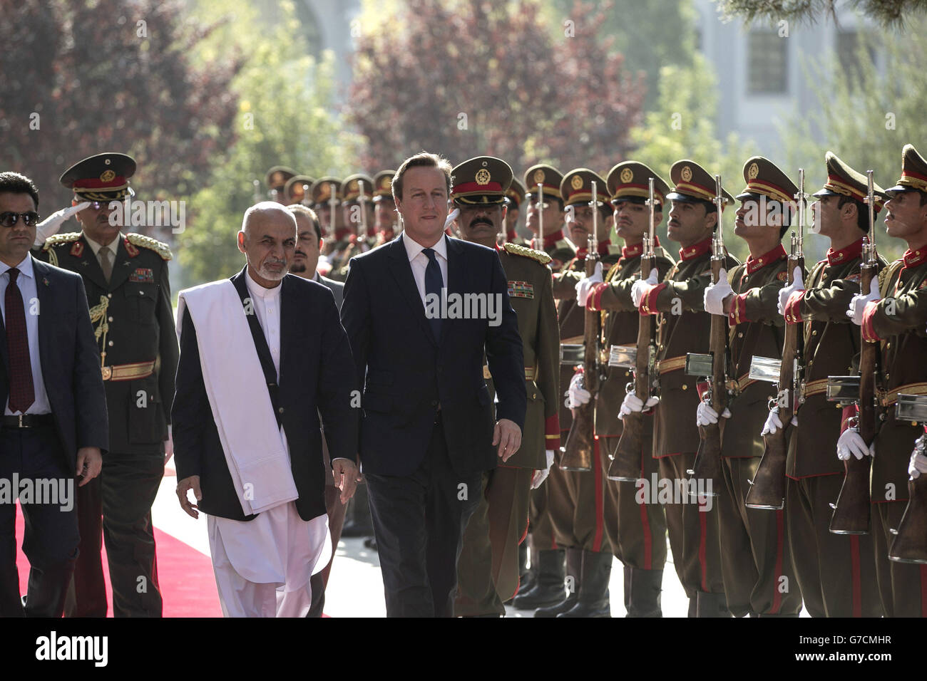 Prime Minister David Cameron is welcomed to the Presidential Palace by ...