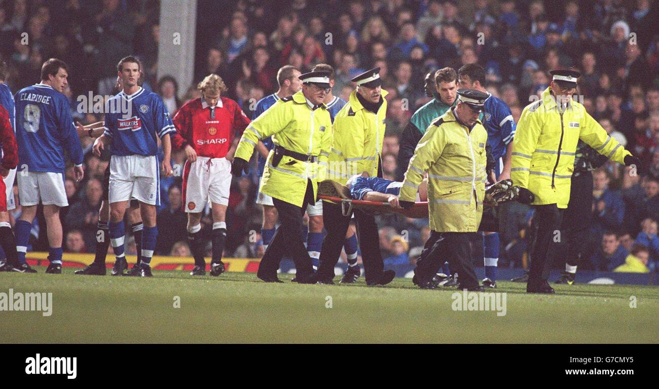 Leicester citys mike whitlow is stretchered off with an injury hi-res ...