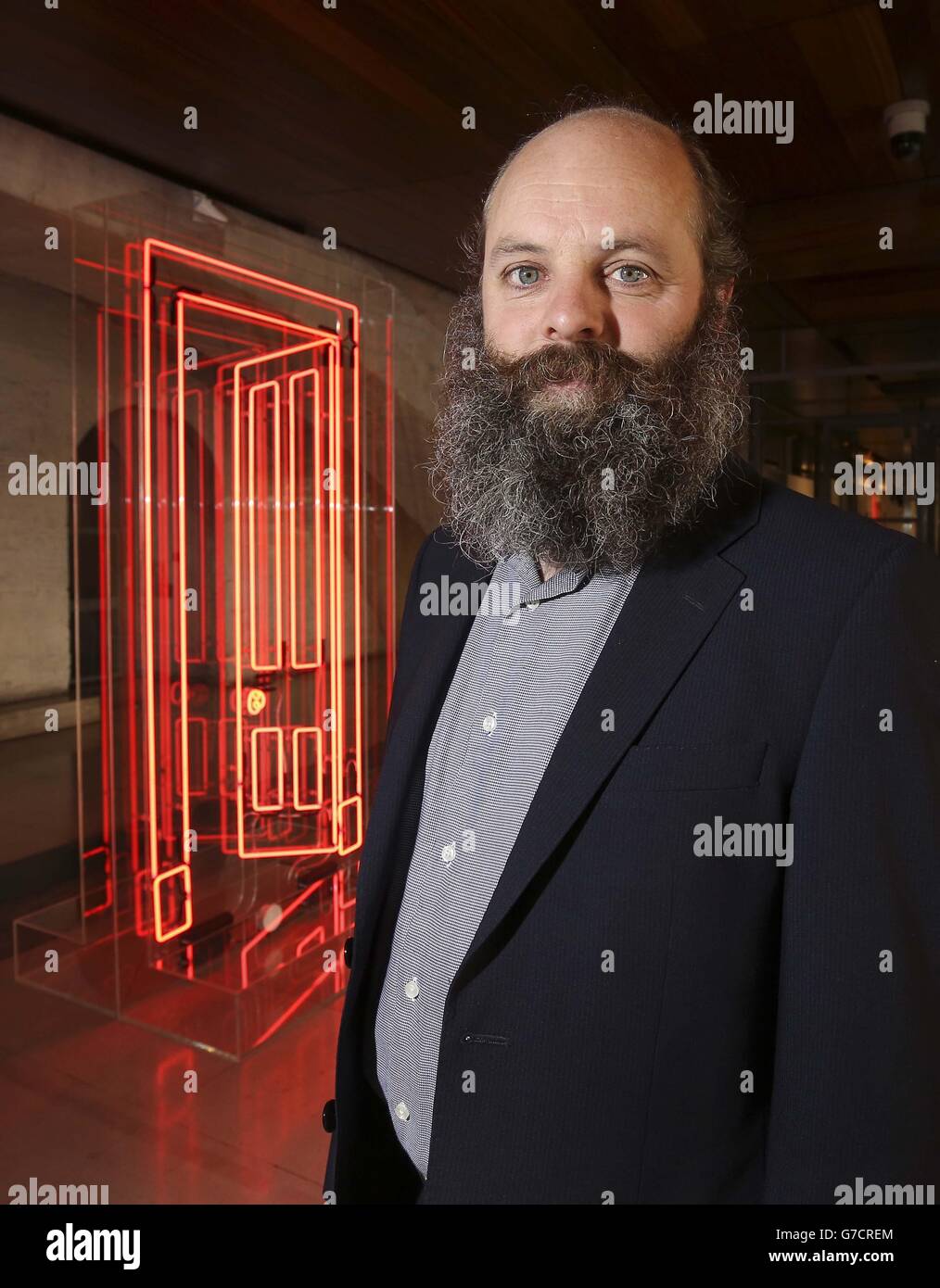 Artist Gavin Turk with his newly reconfigured neon installation ...