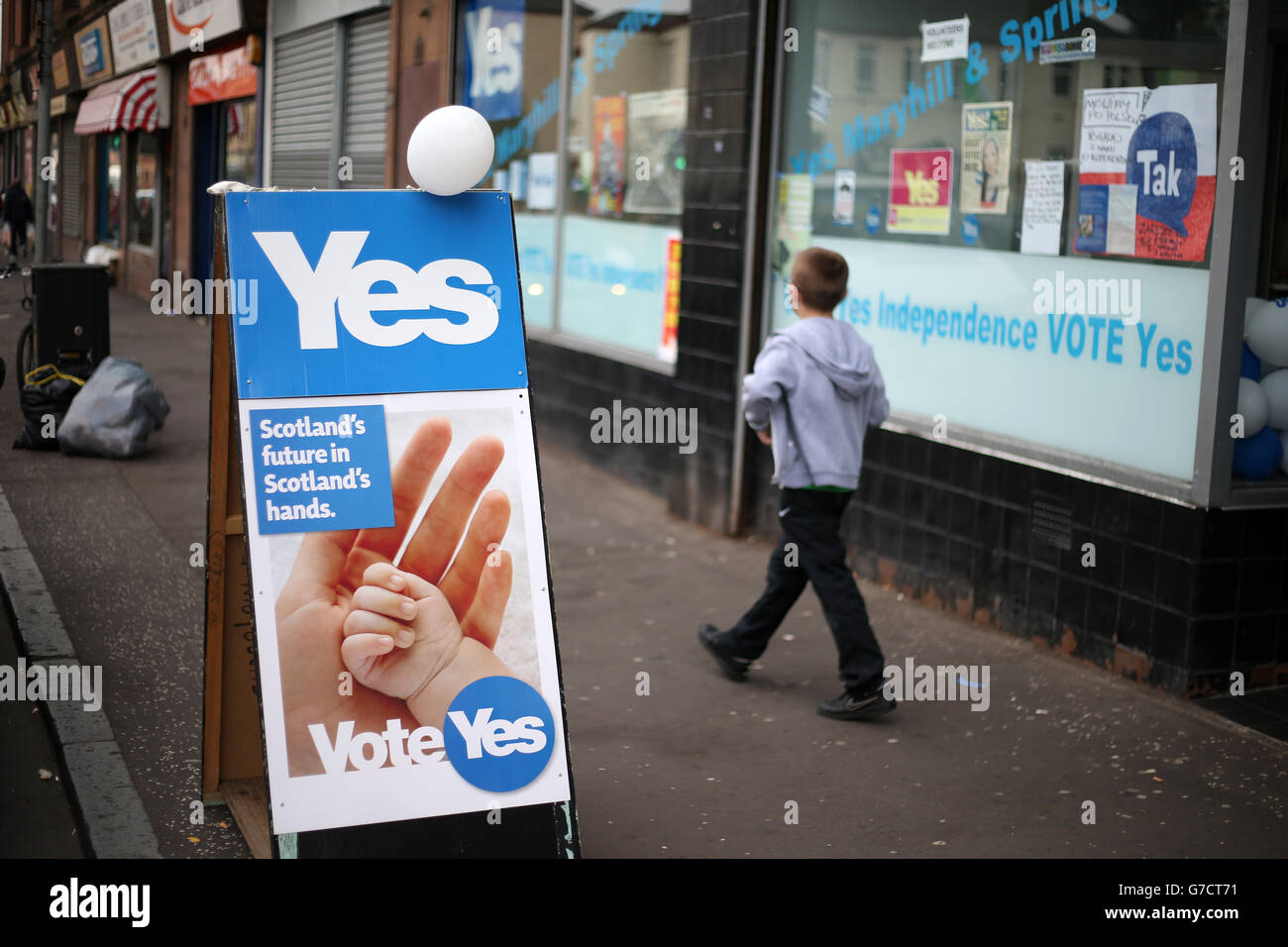 Yes supporter posters in Maryhill, Glasgow, as voters go to the polls ...
