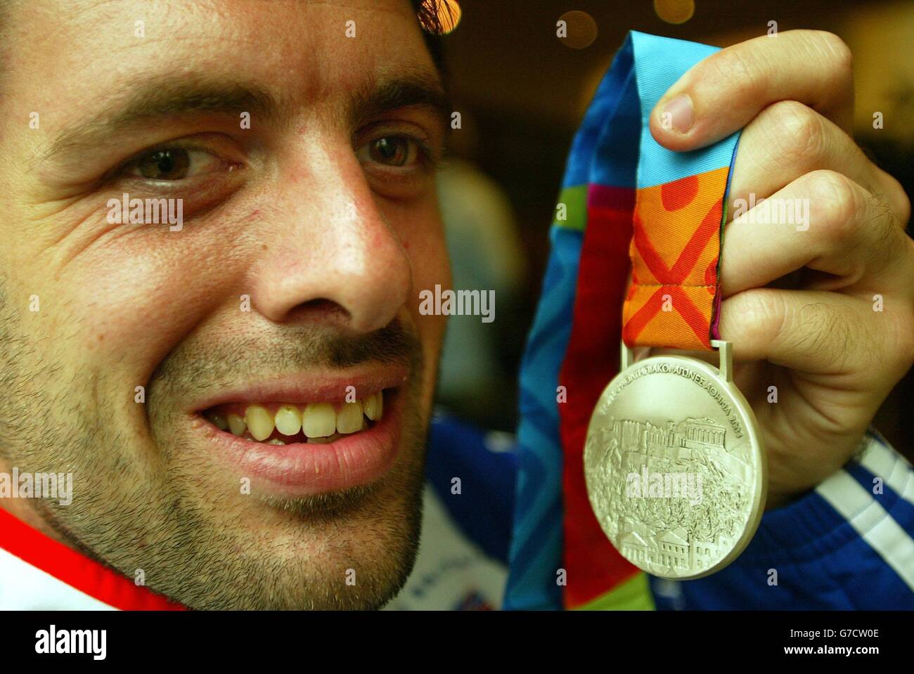 Daniel West from Cambridge with his silver medal in the Discus event ...