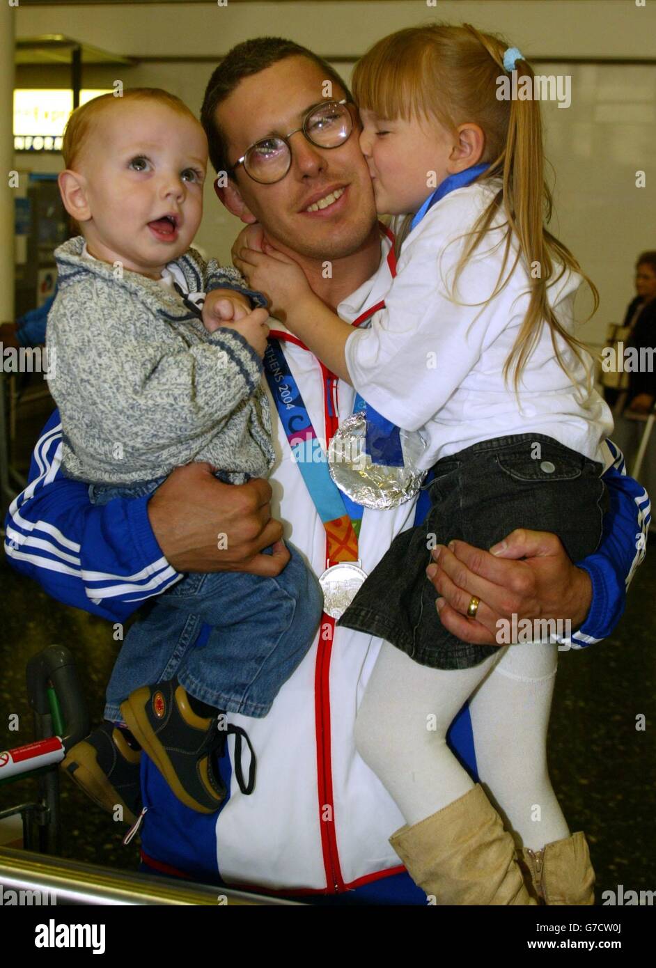 Ian Rose from High Wycombe, Bucks, gets a kiss from his daughter Leah 5 ...