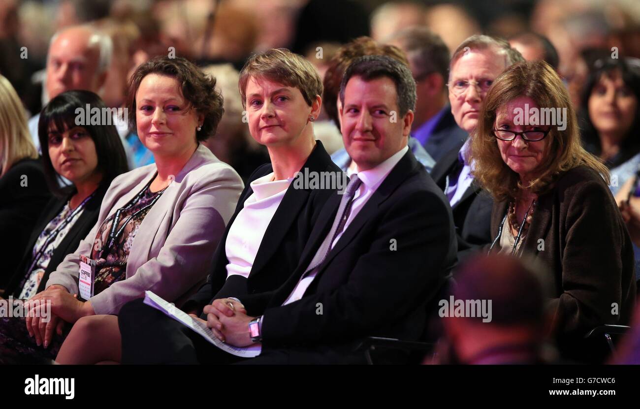 Shadow Home Secretary Yvette Cooper (centre) listens as her husband ...