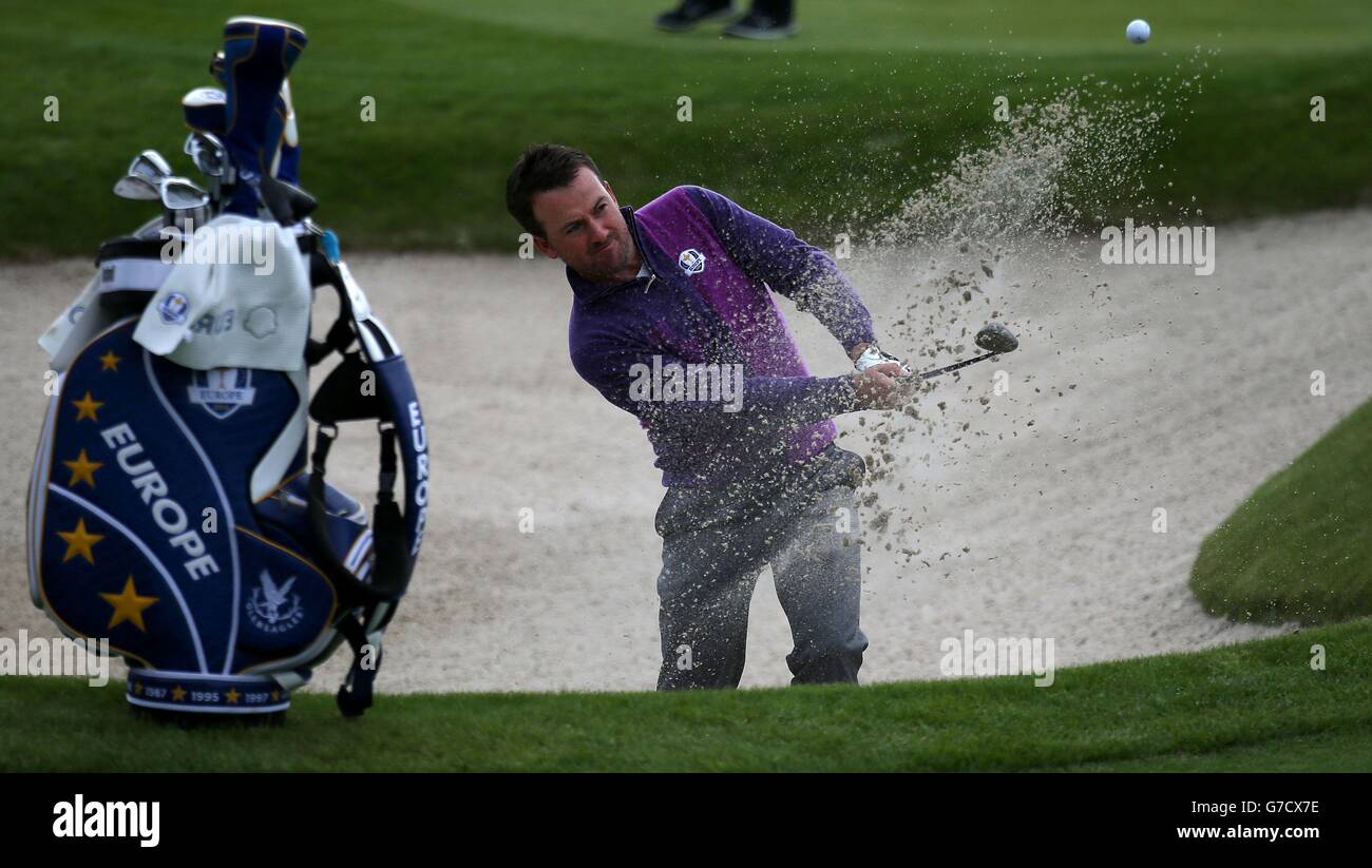 Europe's Graeme McDowell plays from bunker during a practice session at ...