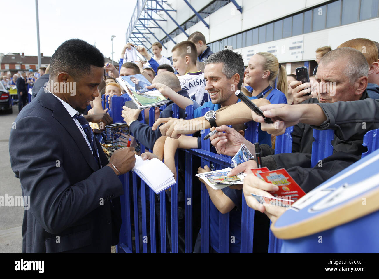 Everton's Samuel Eto'o signs an autograph in the players parade Stock ...