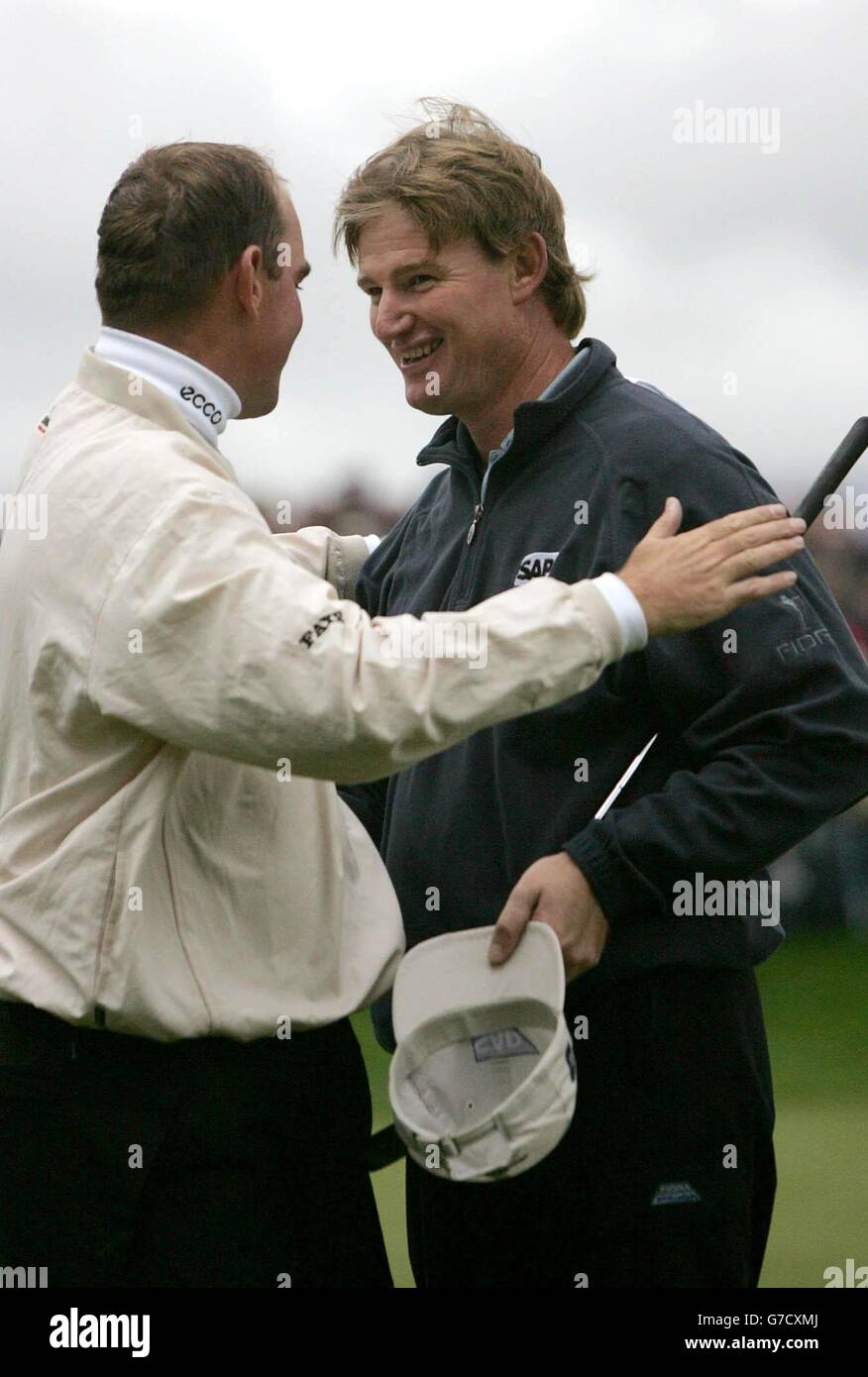 South Africa's Ernie Els is congratulated by Denmark's Thomas Bjorn ...