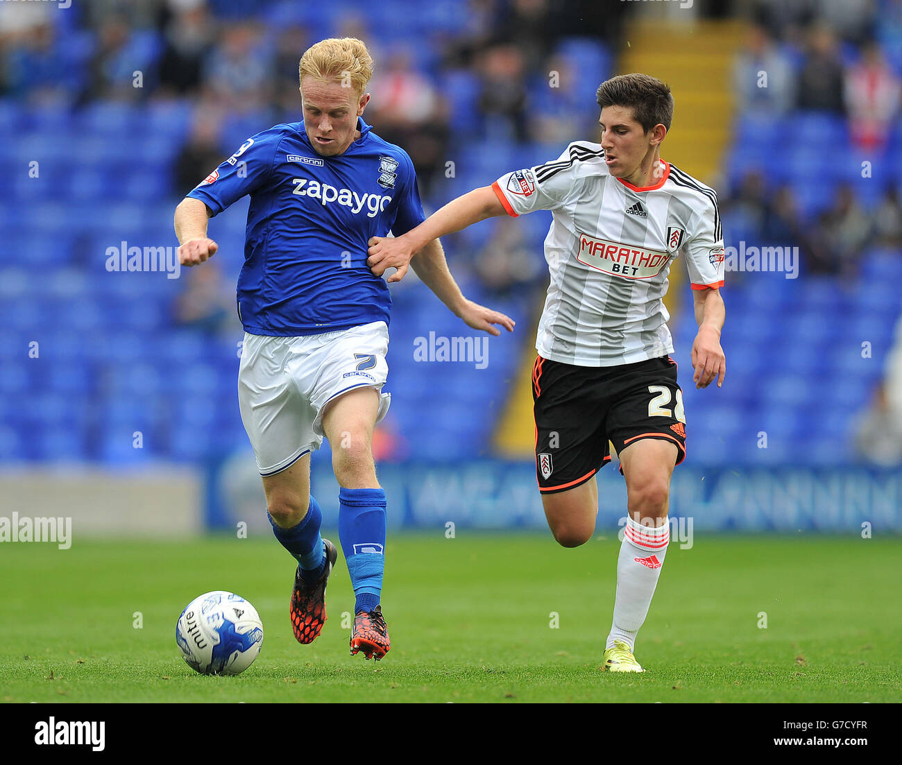 Birmingham City's Mark Duffy (left) out-paces Fulham's Emerson Hyndman ...