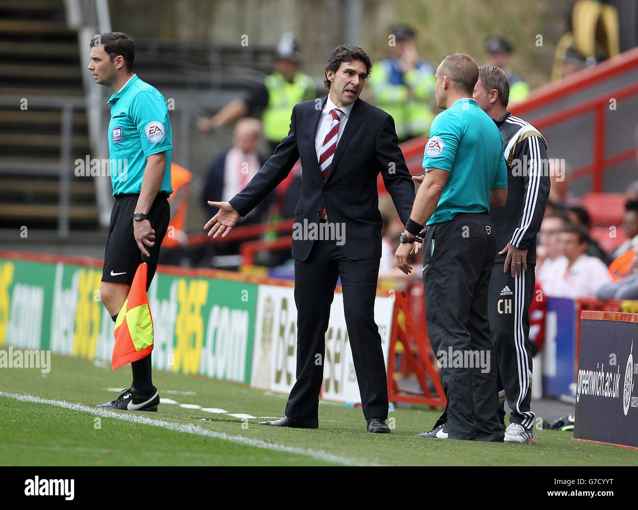 Middlesbrough's manager Aitor Karanka talks with the fourth official ...