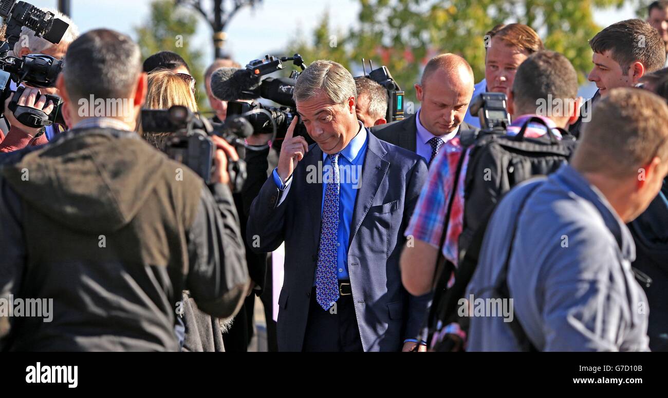 Leader of the Ukip party Nigel Farage (centre) during a visit to the ...