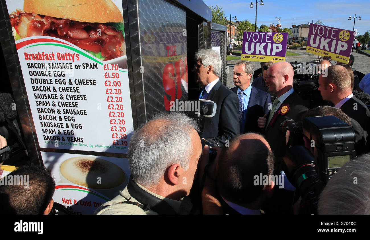 Leader of the Ukip party Nigel Farage (centre) during a visit to the ...