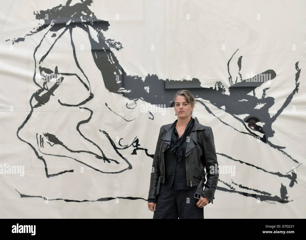 Tracey Emin poses beside her artwork at the press preview of The Last ...