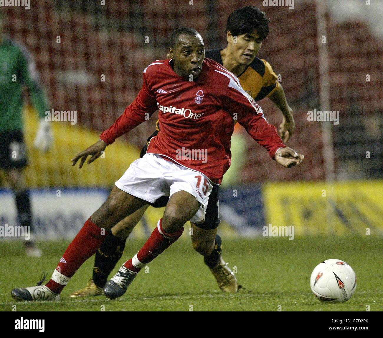 Nottingham Forest's Andrew Impey holds off Wolverhampton Wanderers ...