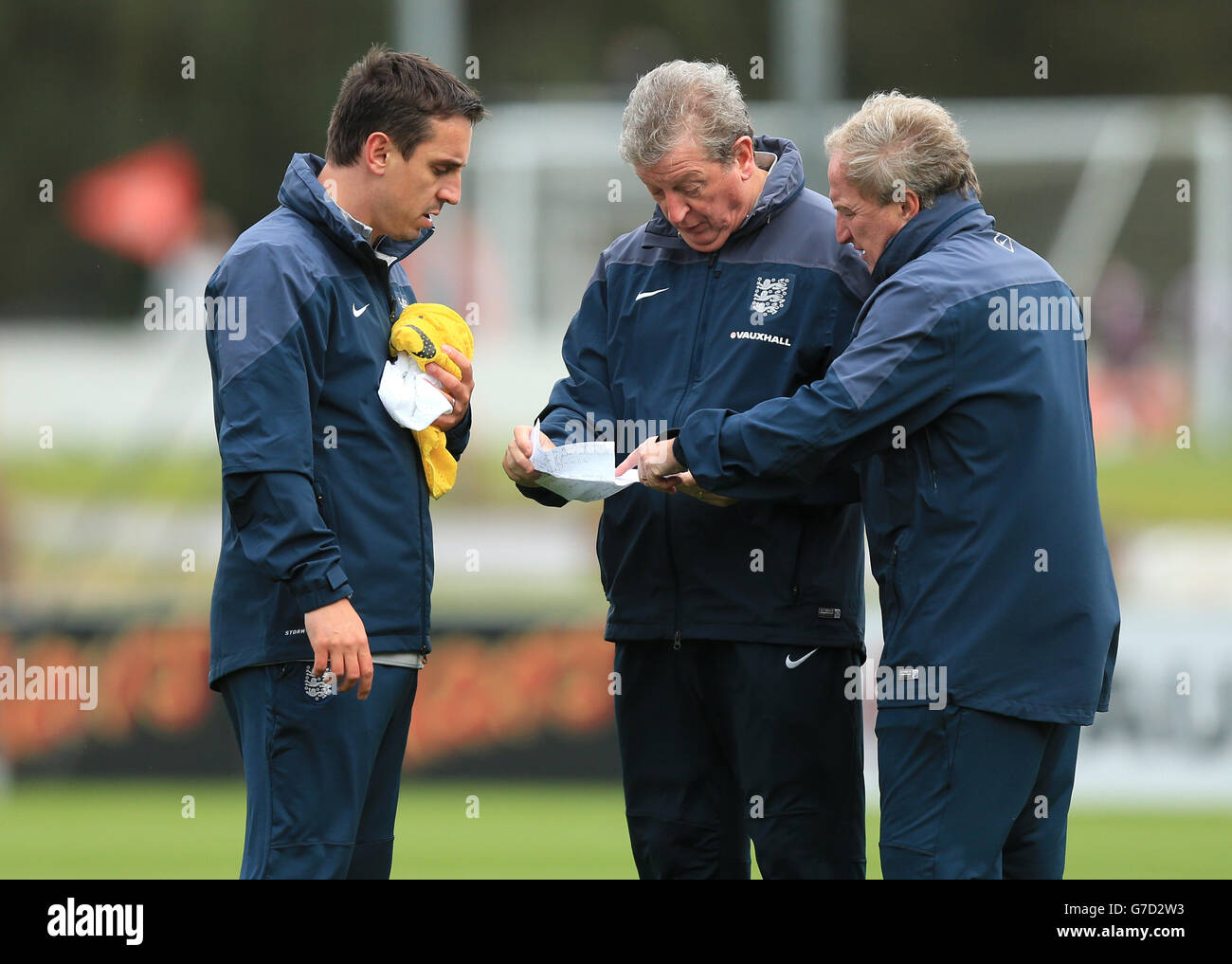 England manager Roy Hodgson (centre) speaks with assistants Gary ...
