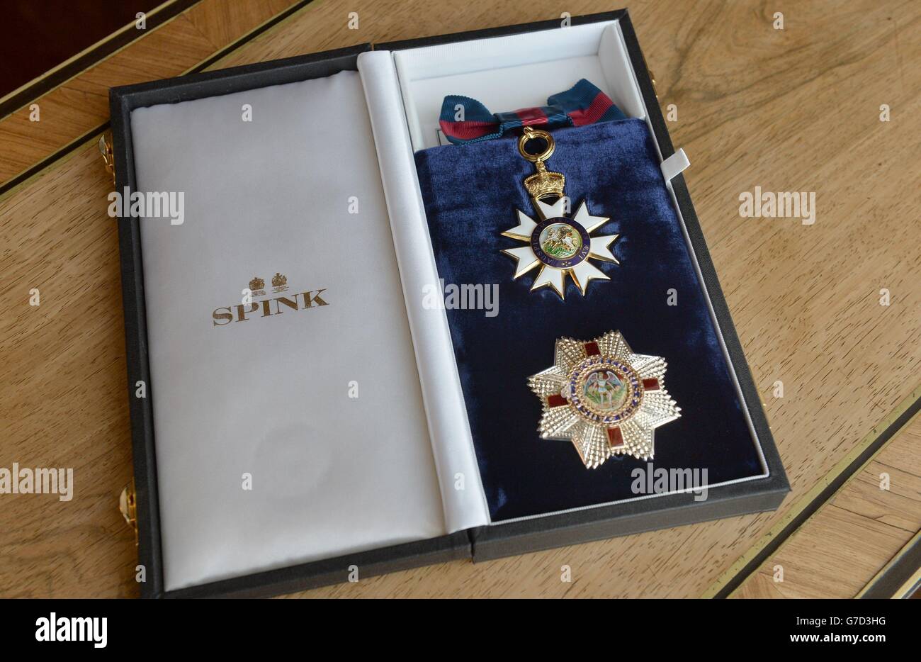 Jolie receiving DCMG Stock Photo - Alamy